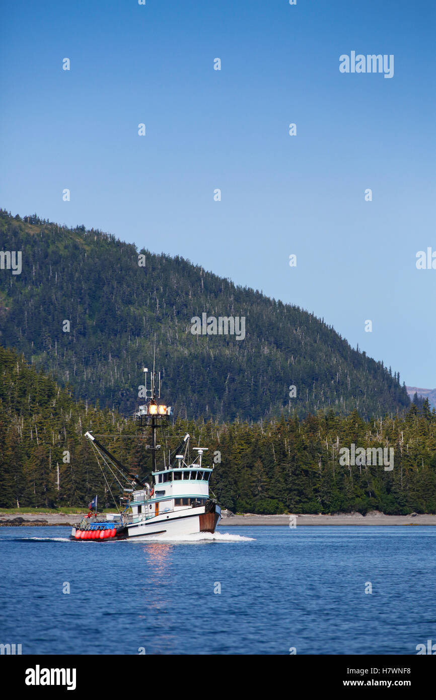 Commercial fishing boat on the waters of Main Bay, Prince William Sound ...