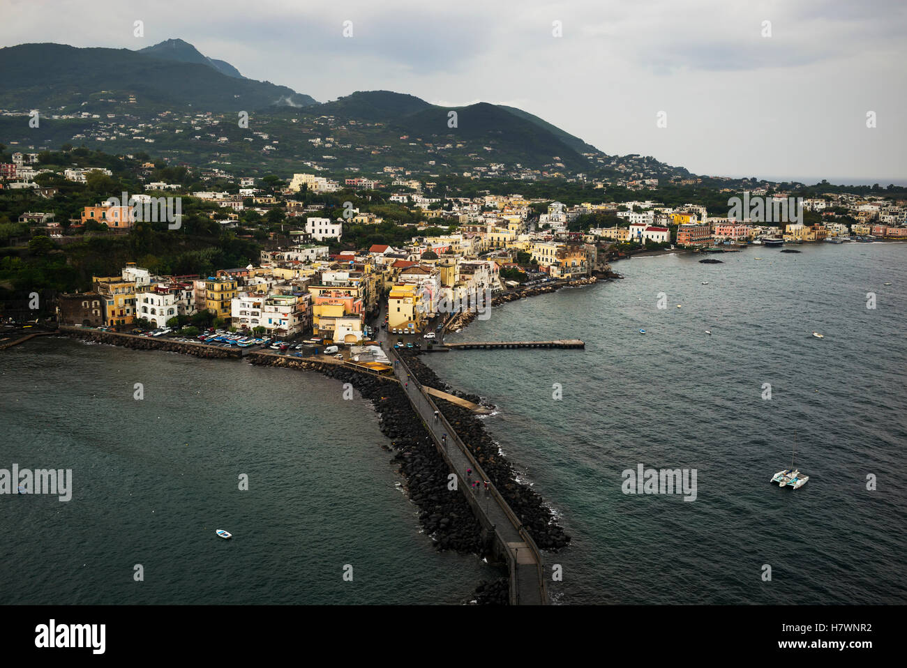 Pedestrians on the causeway leading to Aragonese Castle; Ischia ...