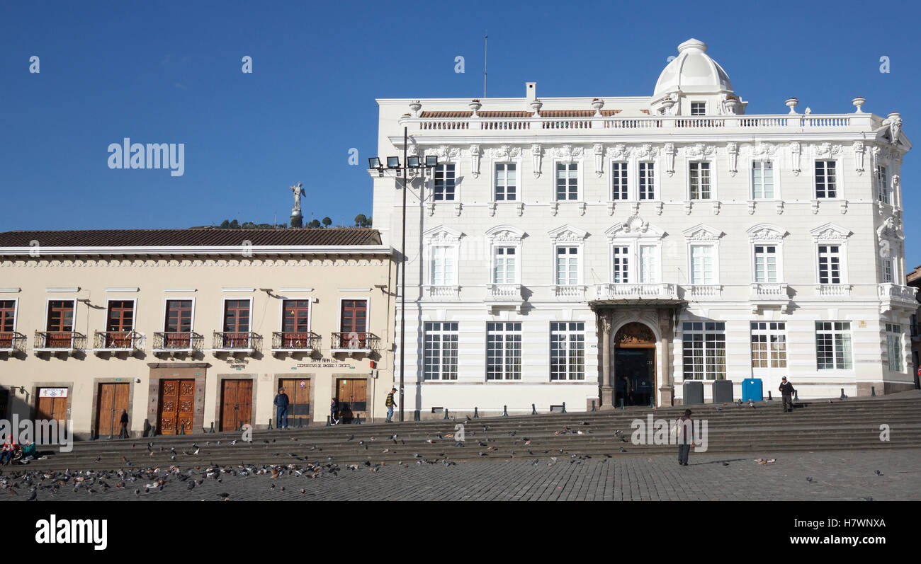 Colonial era hotel building and traditional houses on square in old ...