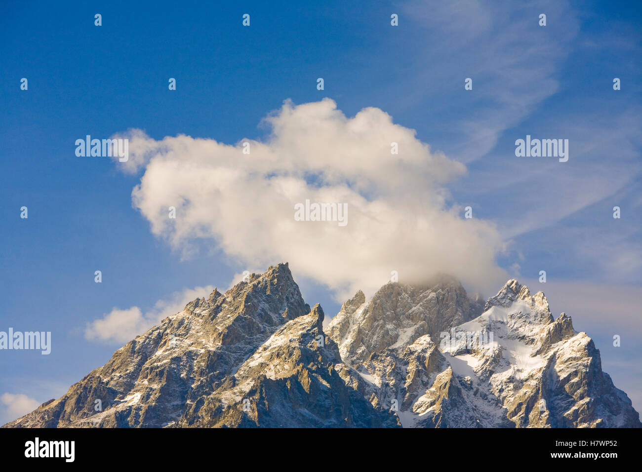 Grand Teton peak with cumulus clouds, Grand Teton National Park ...