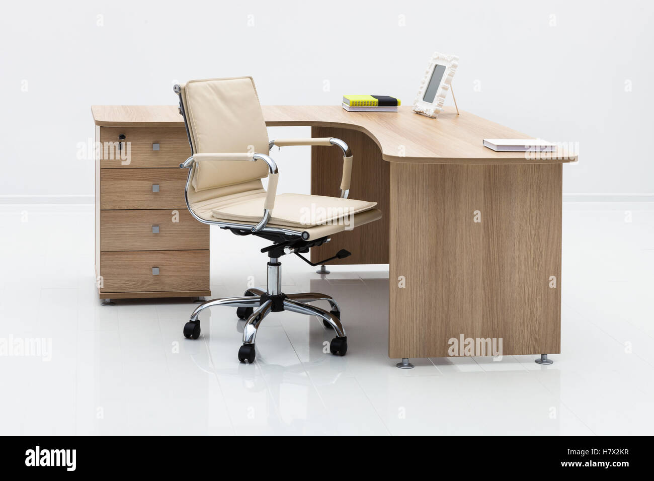 light wood desk in the office Stock Photo - Alamy