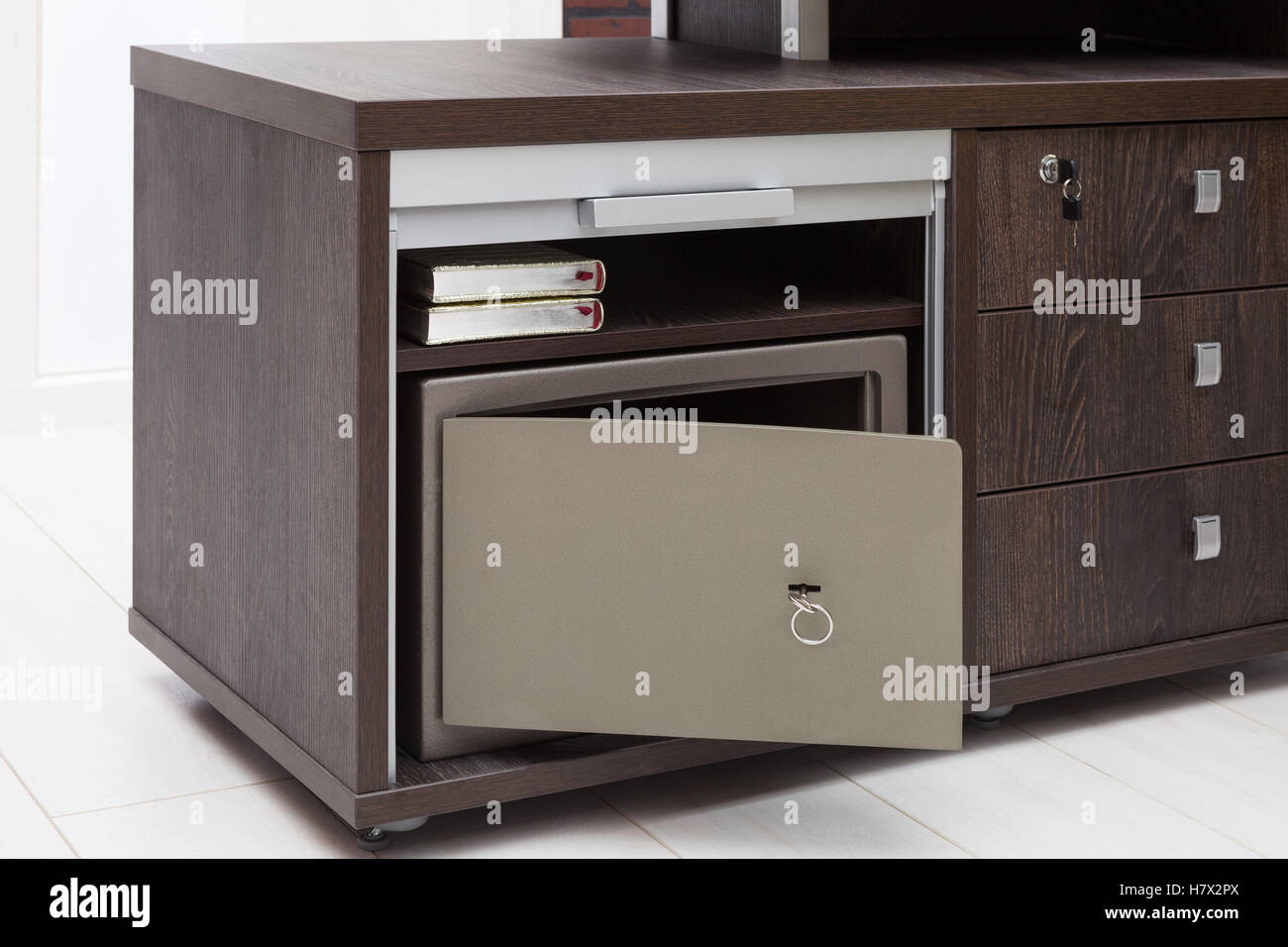 modern metal safe in a office Stock Photo - Alamy