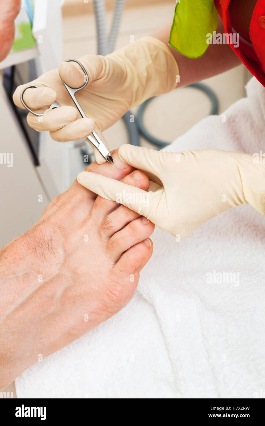 pedicure man in a modern beauty salon Stock Photo - Alamy