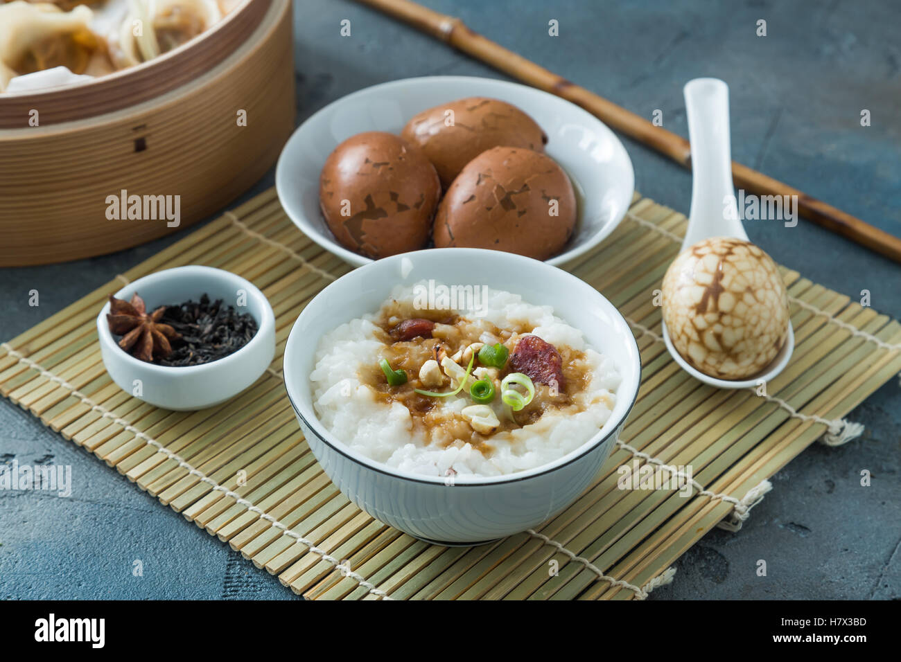 Traditional chinese rice porridge on dinner table Stock Photo - Alamy