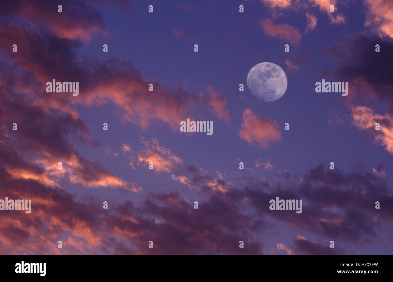 Clouds and full moon, Spain Stock Photo - Alamy