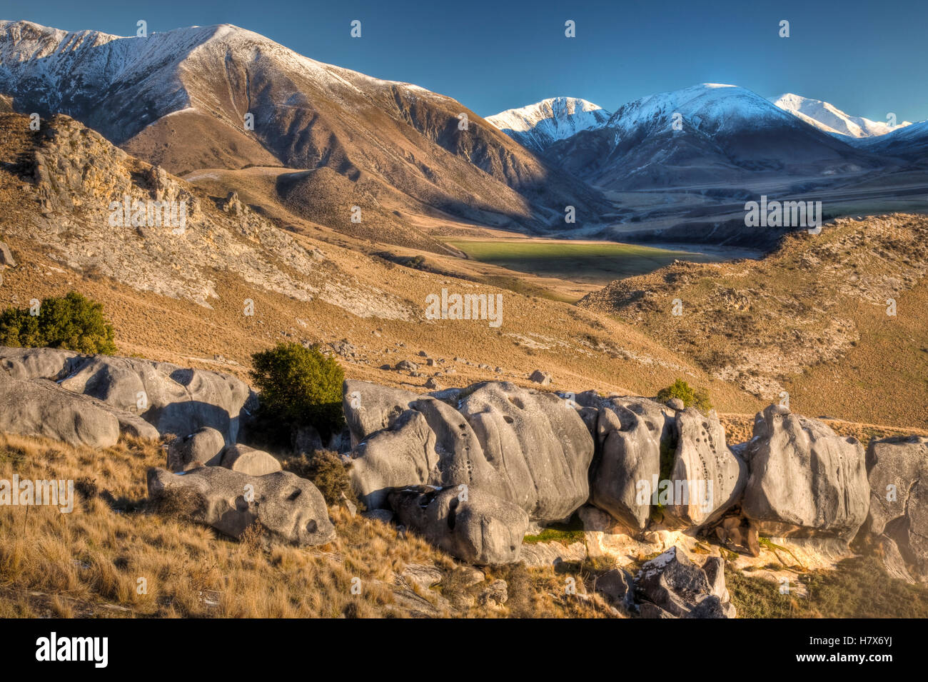 Boulders of Prebble Hill with Torlesse Range behind, Castle Hill Basin ...