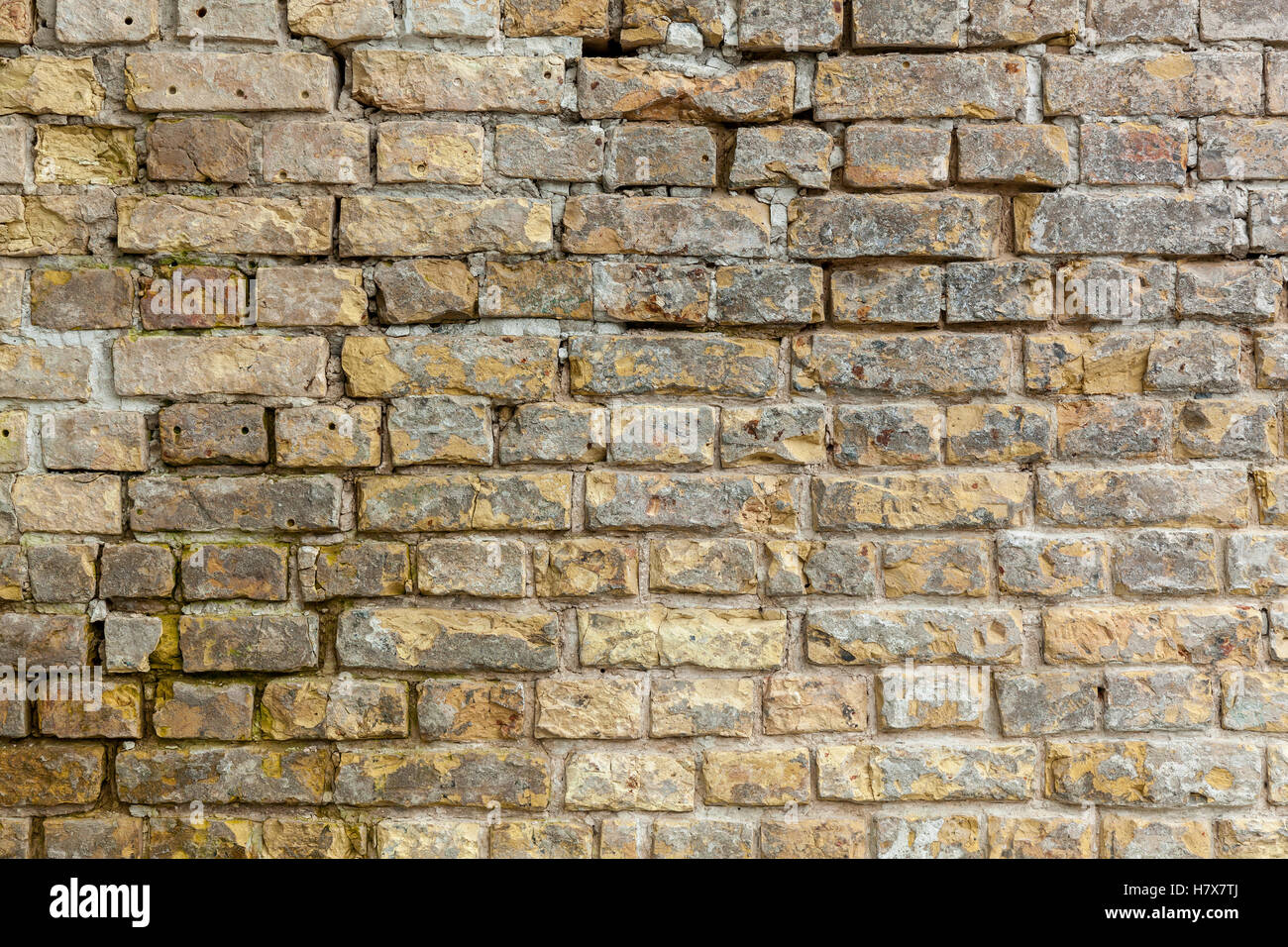 Brick wall. Brick wall. Brick wall with bricks of different sizes and ...