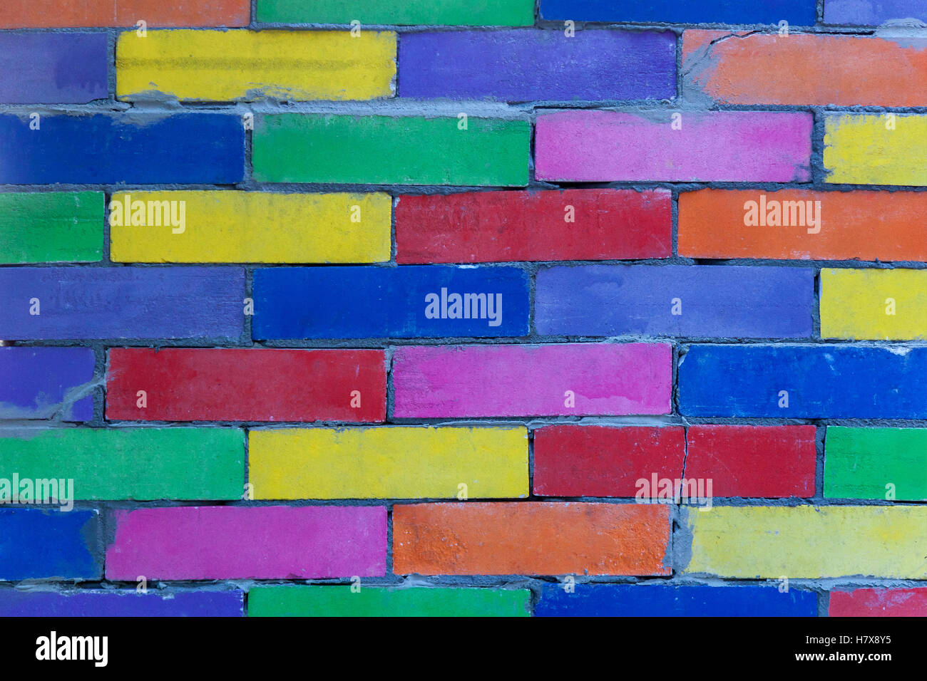 Multicolored wall. Abstract fun multicolored painted brick wall Stock ...