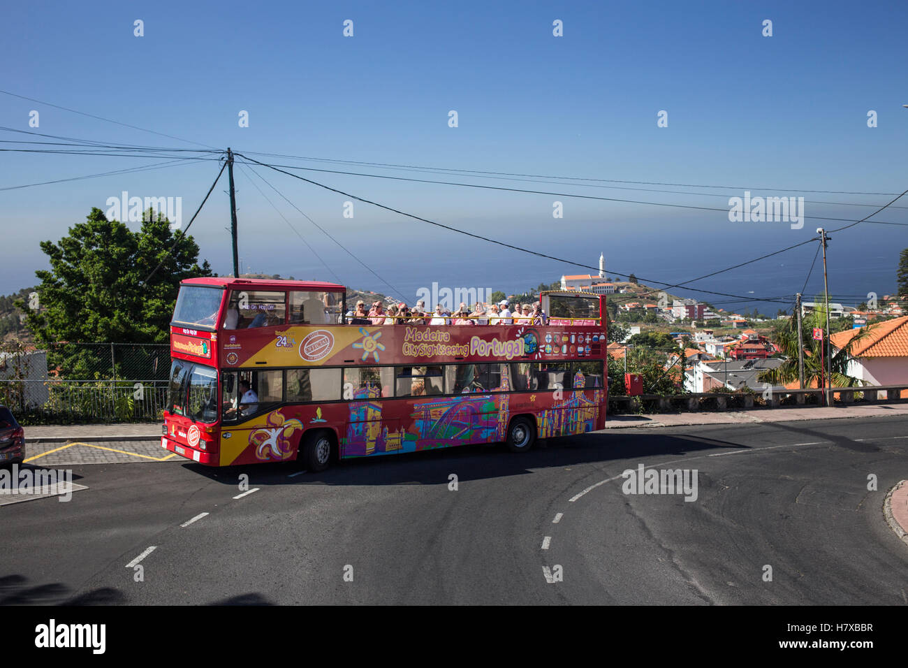 Red tourist bus in Funchal, Madeira, Portugal Stock Photo - Alamy