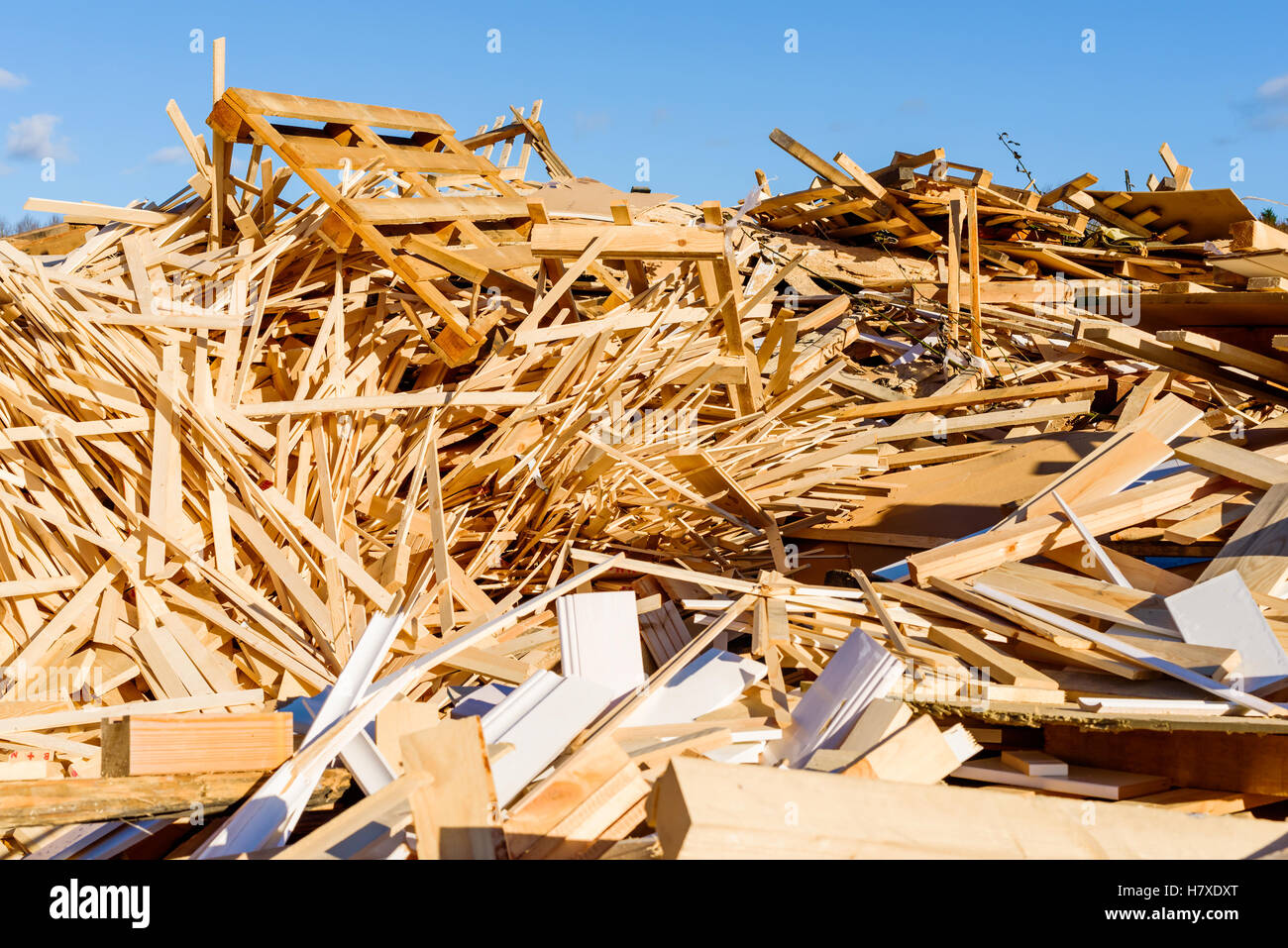 Pile of wooden debris in industrial area. The wood is later shredded to ...