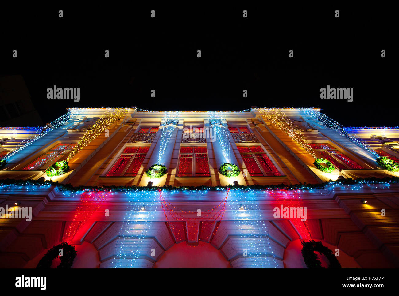 architecture old building at night illuminated with colored spotlights ...