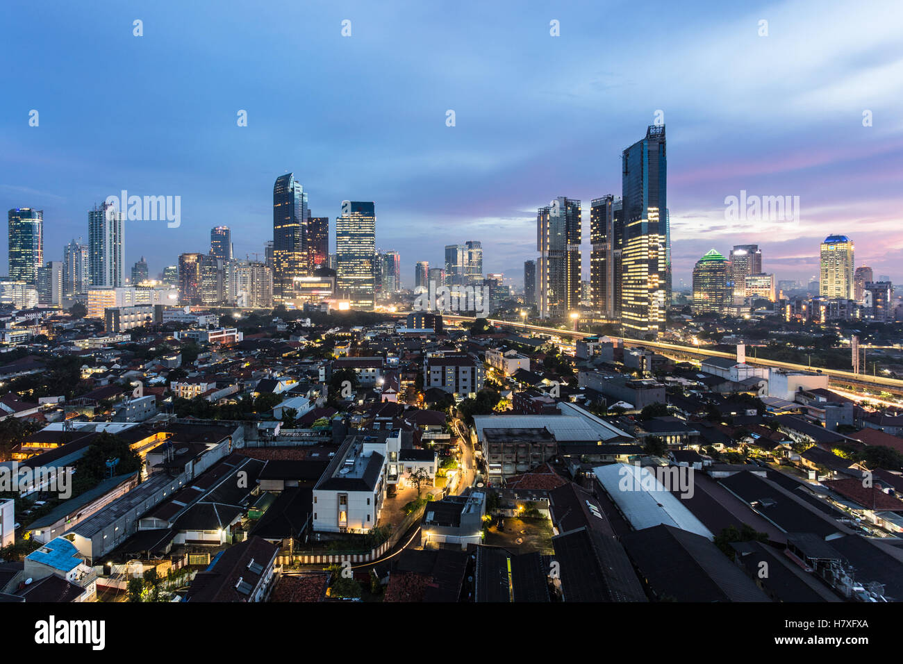 An aerial view of a stunning sunset over the modern buildings of the ...
