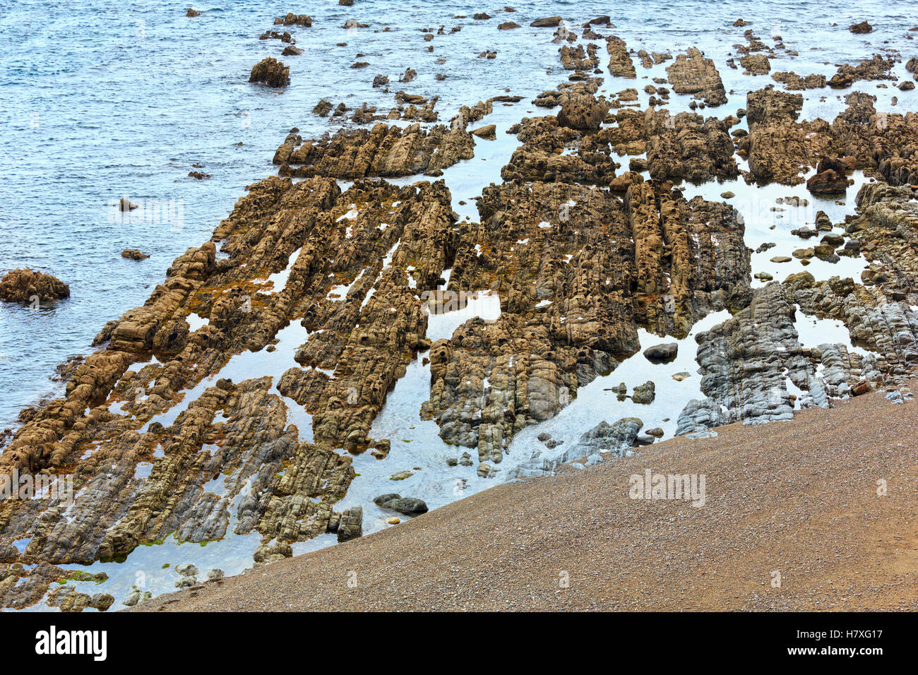 Summer Atlantic ocean (Biscay bay) coast with rock formations near ...