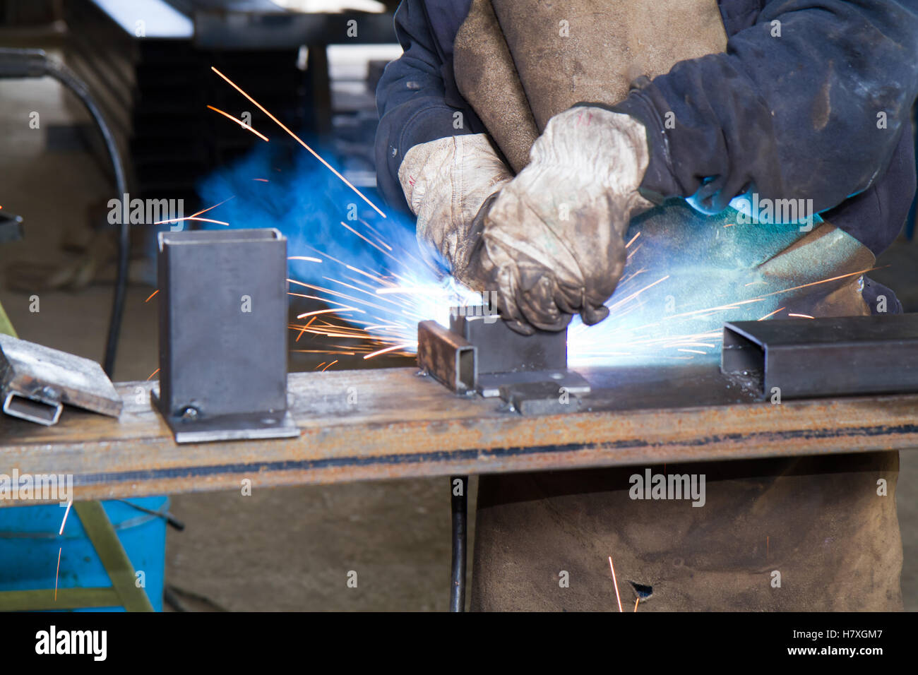 metalworker at work in his workshop Stock Photo - Alamy