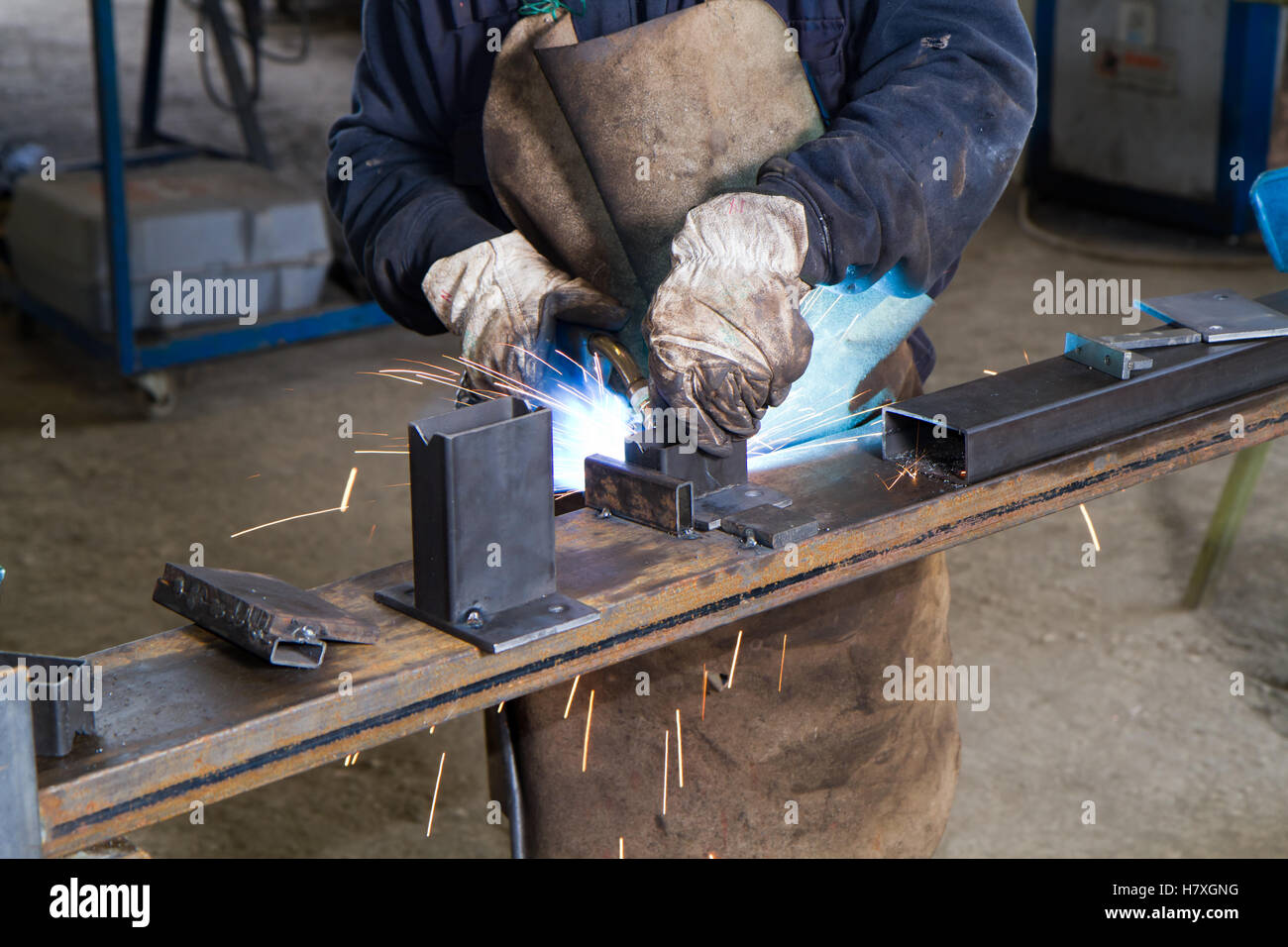 metalworker at work in his workshop Stock Photo - Alamy