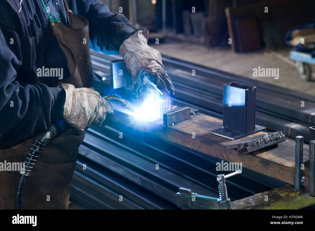 metalworker at work in his workshop Stock Photo - Alamy