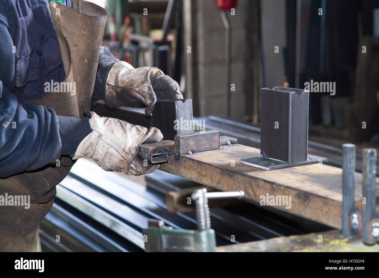 metalworker at work in his workshop Stock Photo - Alamy