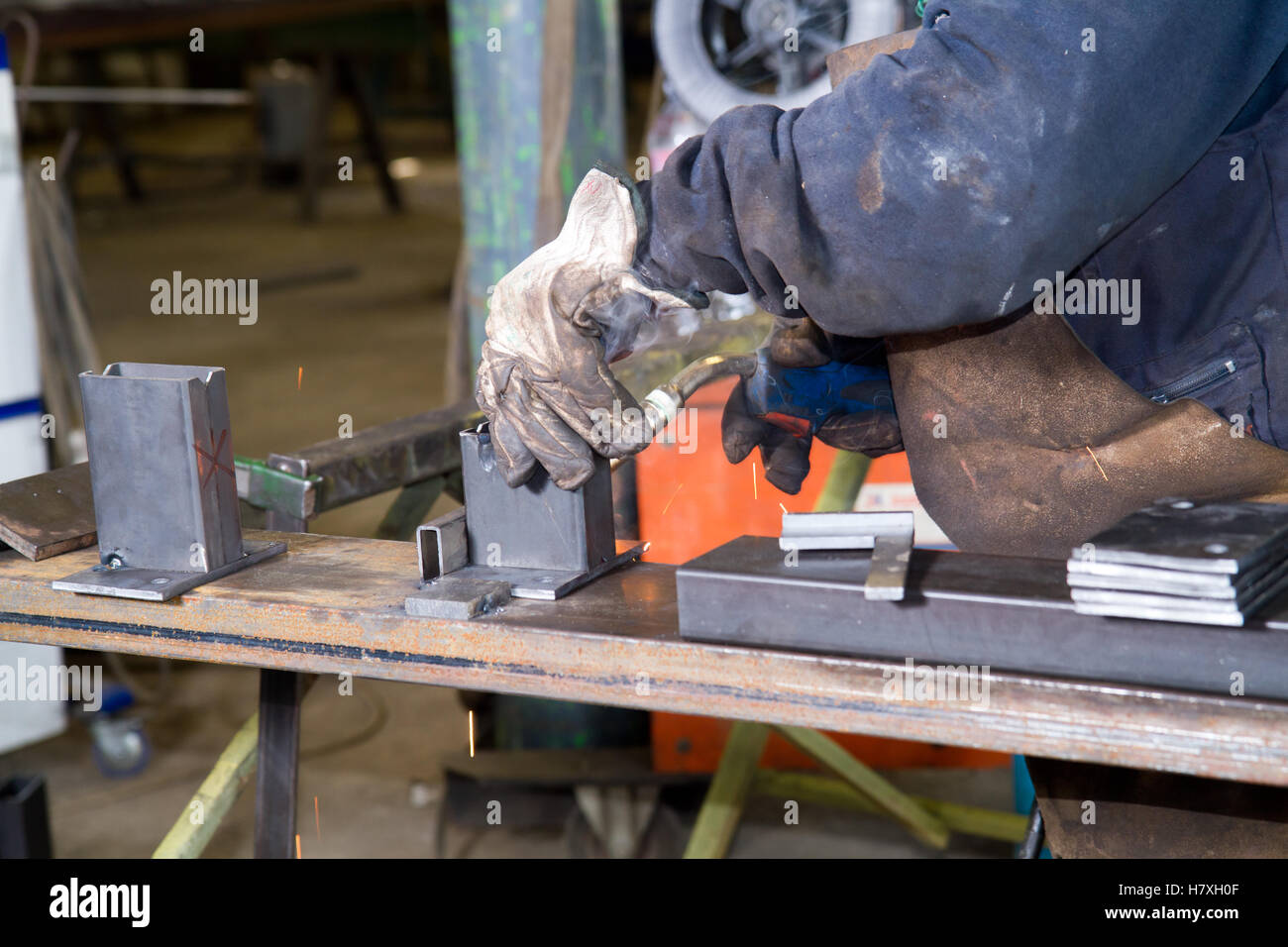 metalworker at work in his workshop Stock Photo - Alamy