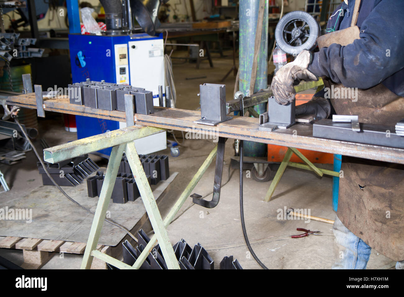 metalworker at work in his workshop Stock Photo - Alamy
