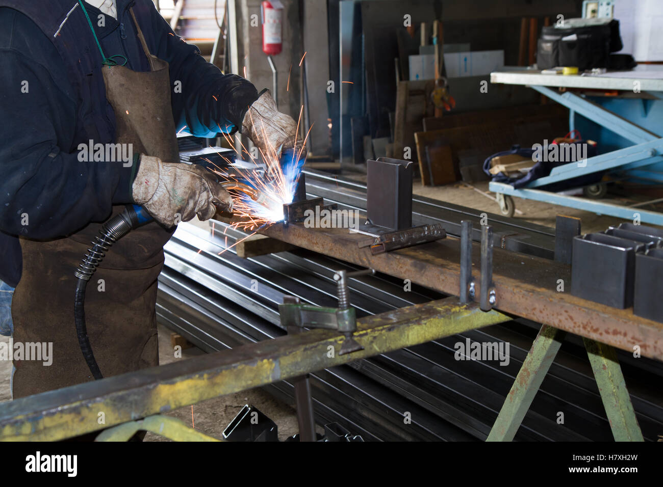 metalworker at work in his workshop Stock Photo - Alamy