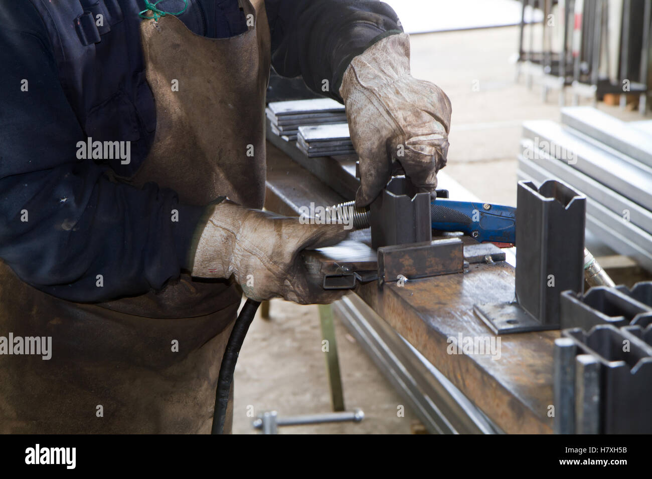 metalworker at work in his workshop Stock Photo - Alamy