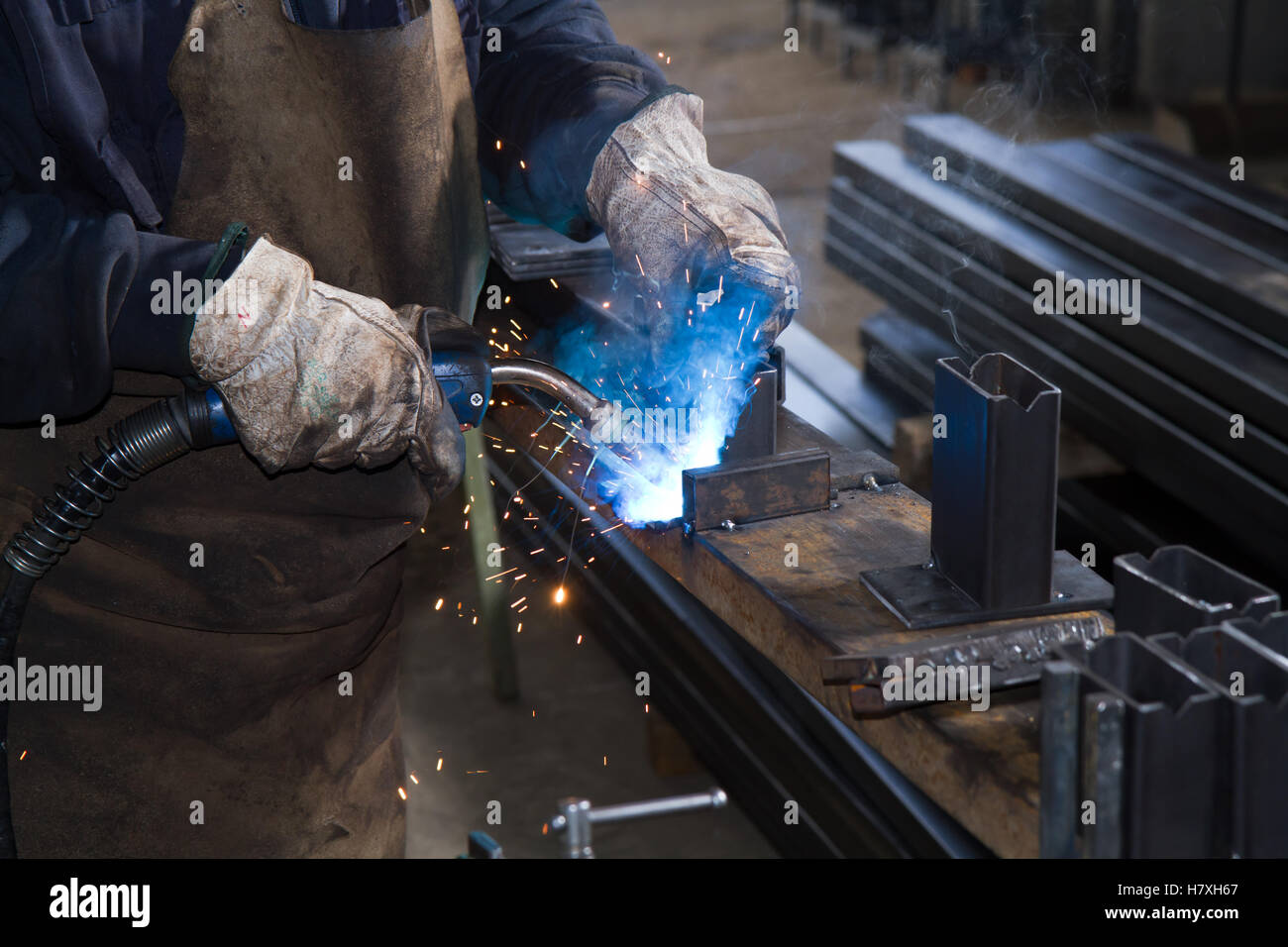 metalworker at work in his workshop Stock Photo - Alamy