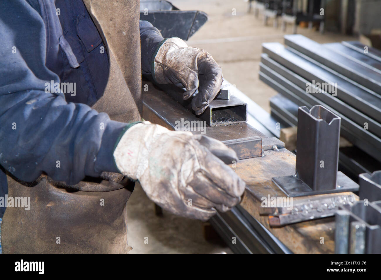 metalworker at work in his workshop Stock Photo - Alamy