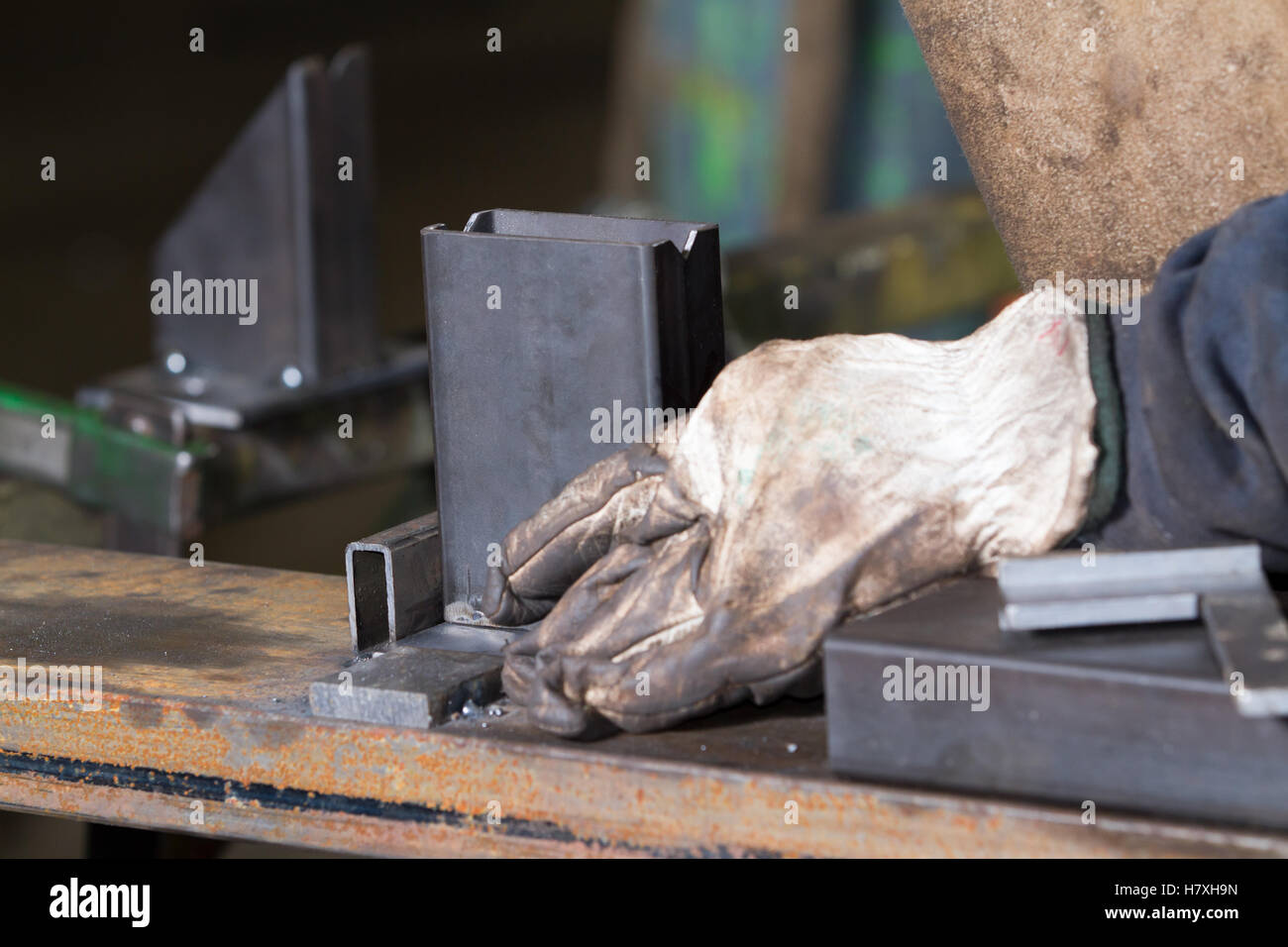 metalworker at work in his workshop Stock Photo - Alamy