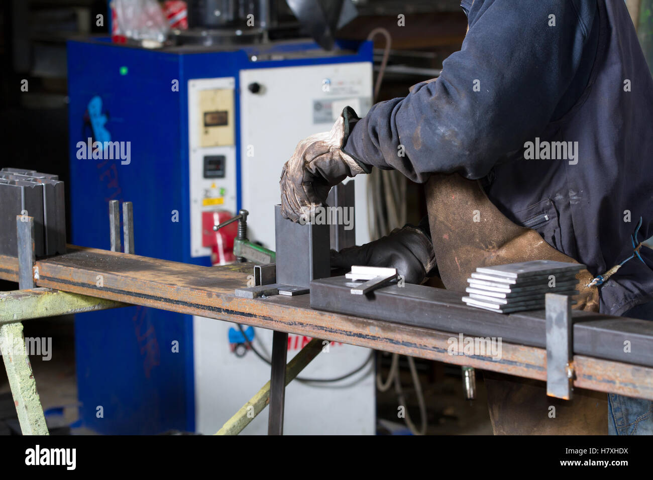 metalworker at work in his workshop Stock Photo - Alamy