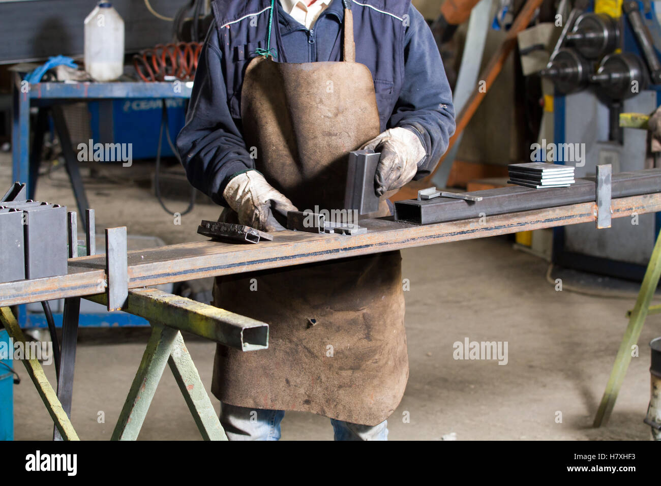 metalworker at work in his workshop Stock Photo - Alamy