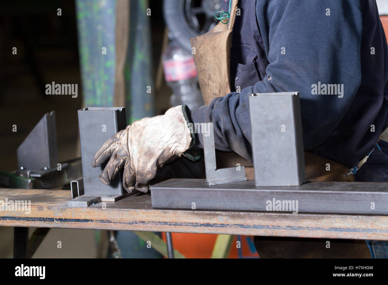 metalworker at work in his workshop Stock Photo - Alamy