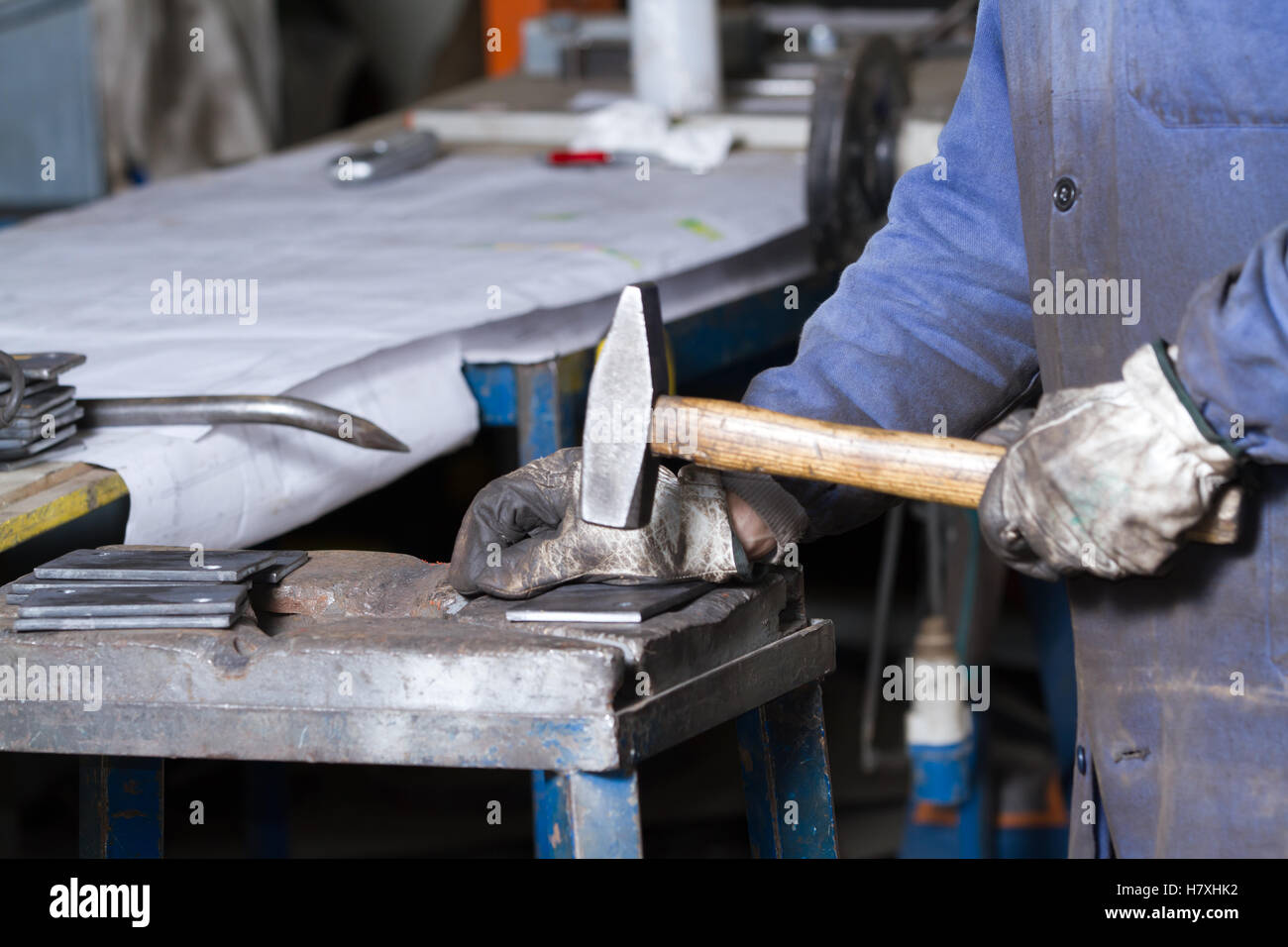 metalworker at work in his workshop Stock Photo - Alamy