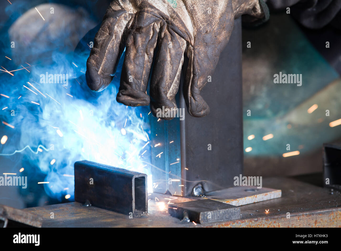 metalworker at work in his workshop Stock Photo - Alamy