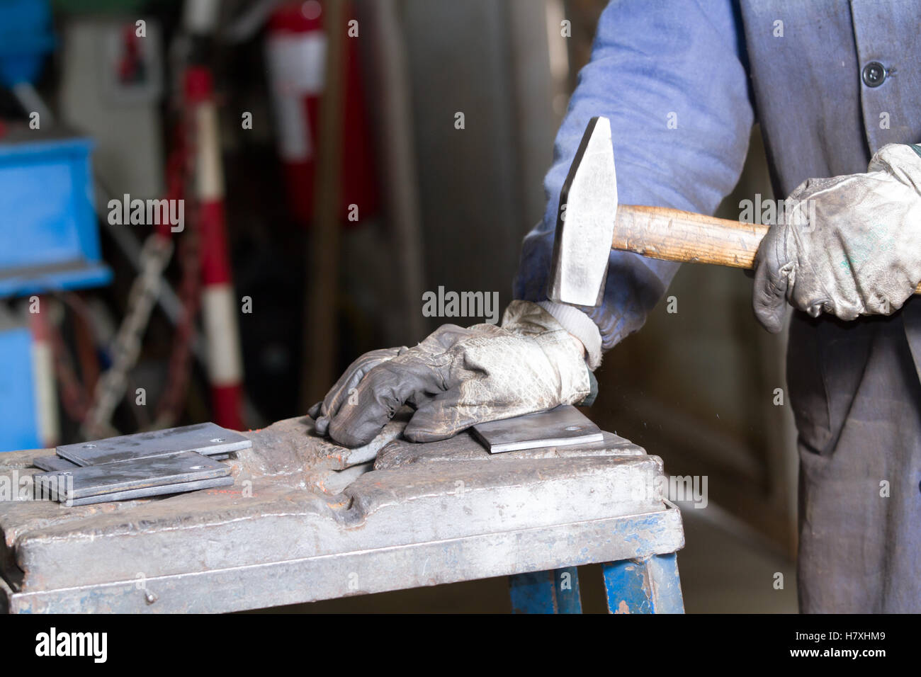 metalworker at work in his workshop Stock Photo - Alamy
