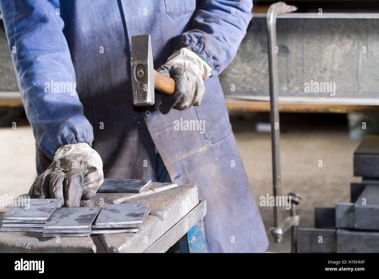 metalworker at work in his workshop Stock Photo - Alamy