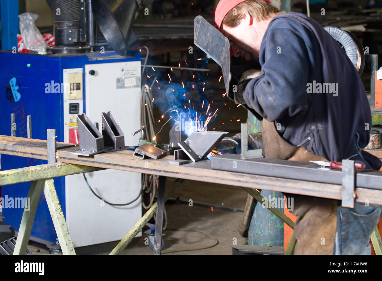 metalworker at work in his workshop Stock Photo - Alamy