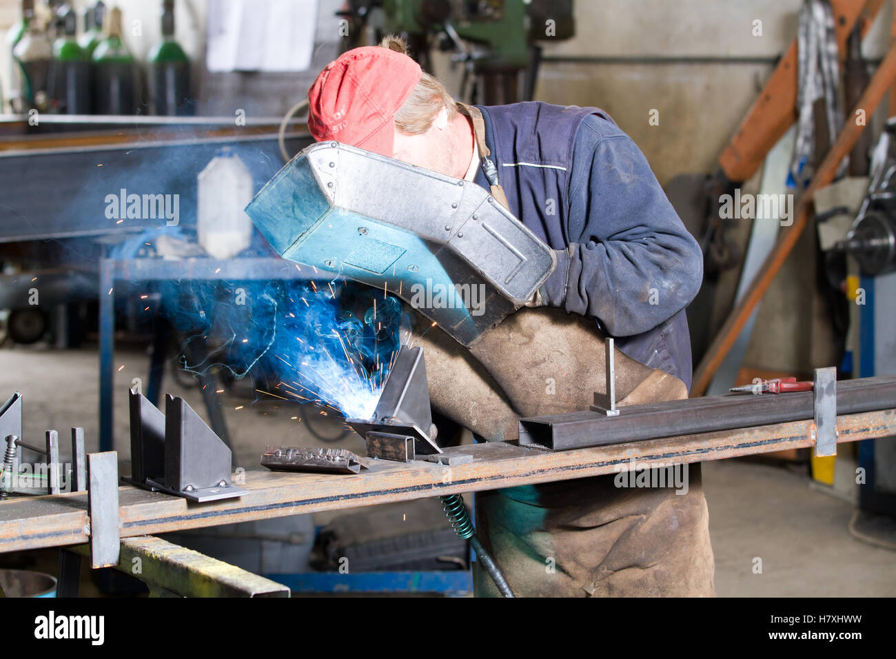 metalworker at work in his workshop Stock Photo - Alamy