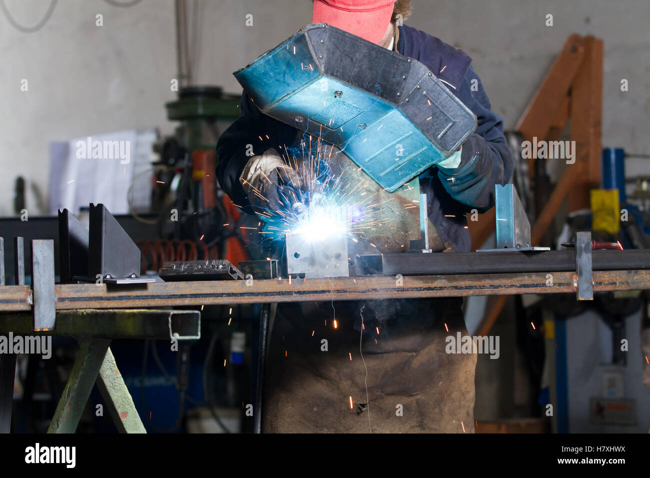 metalworker at work in his workshop Stock Photo - Alamy