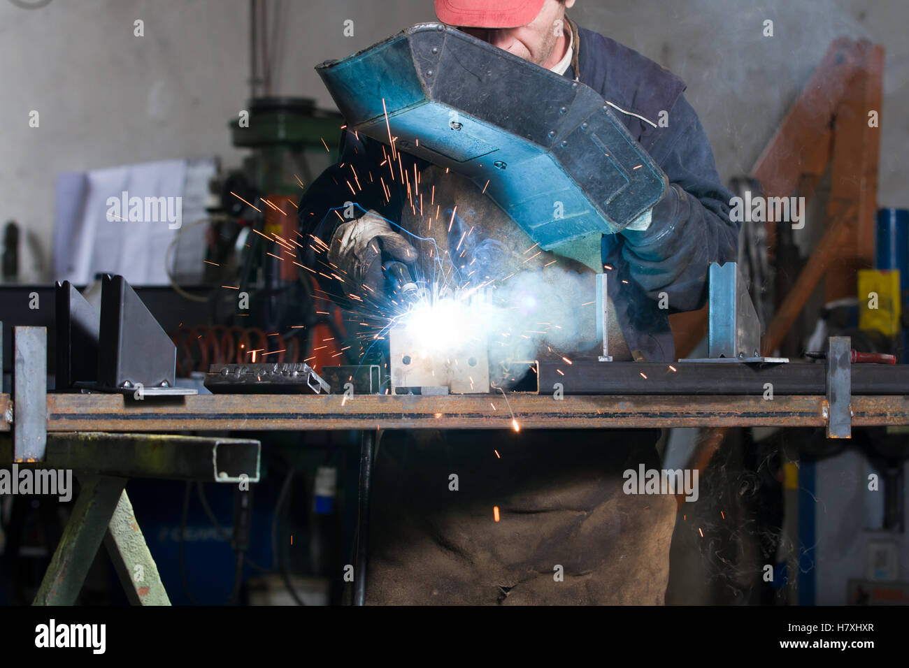 metalworker at work in his workshop Stock Photo - Alamy