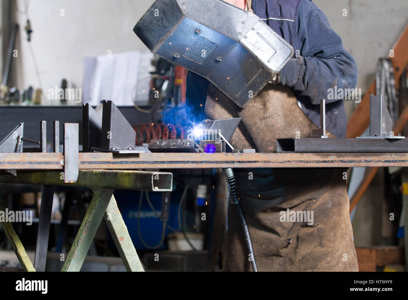metalworker at work in his workshop Stock Photo - Alamy