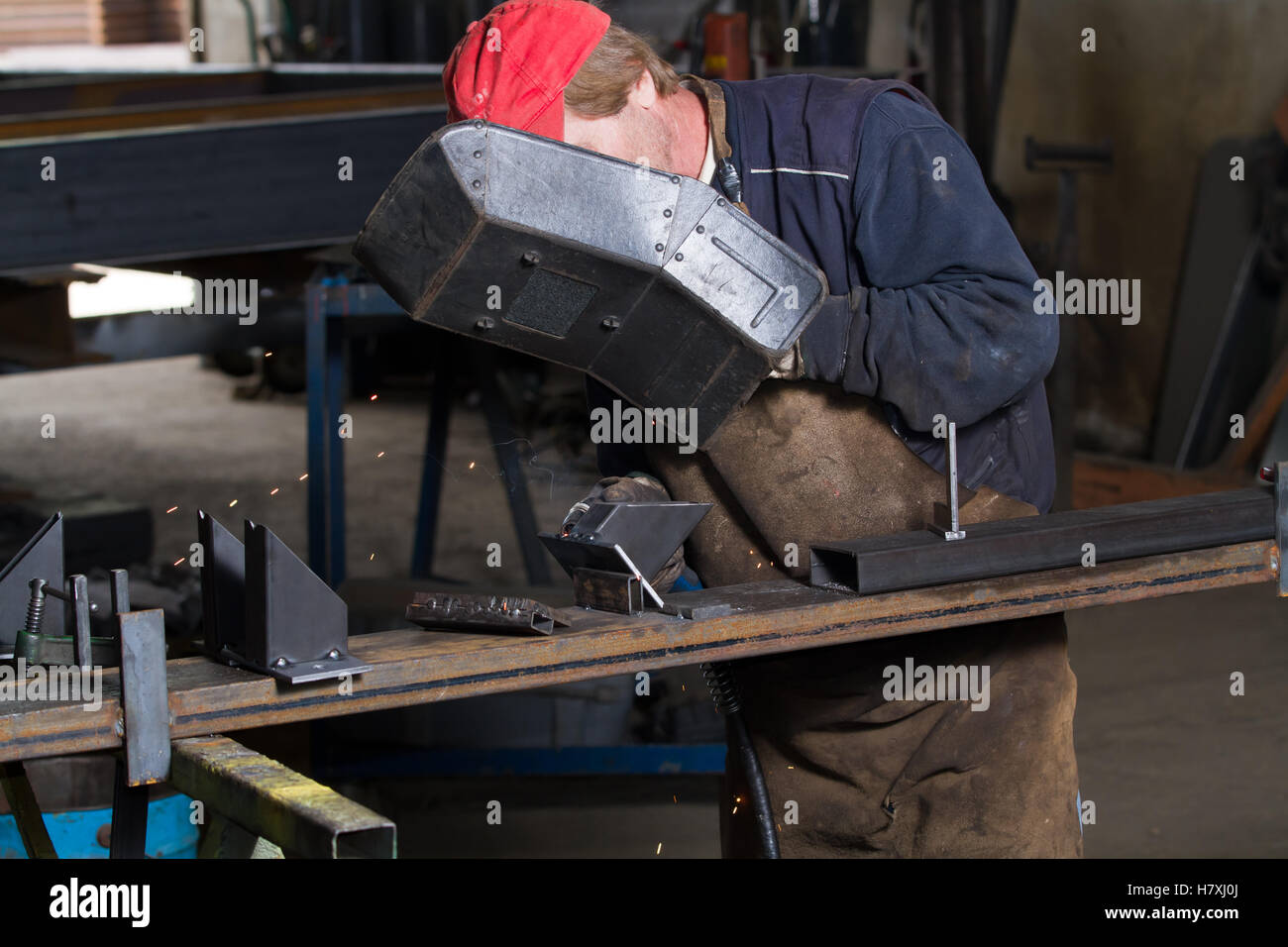 metalworker at work in his workshop Stock Photo - Alamy