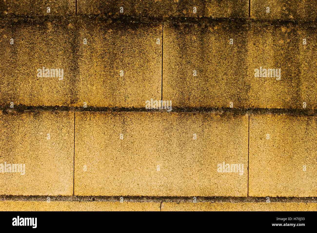 Surface of a yellow wall stained by the passage of time Stock Photo - Alamy