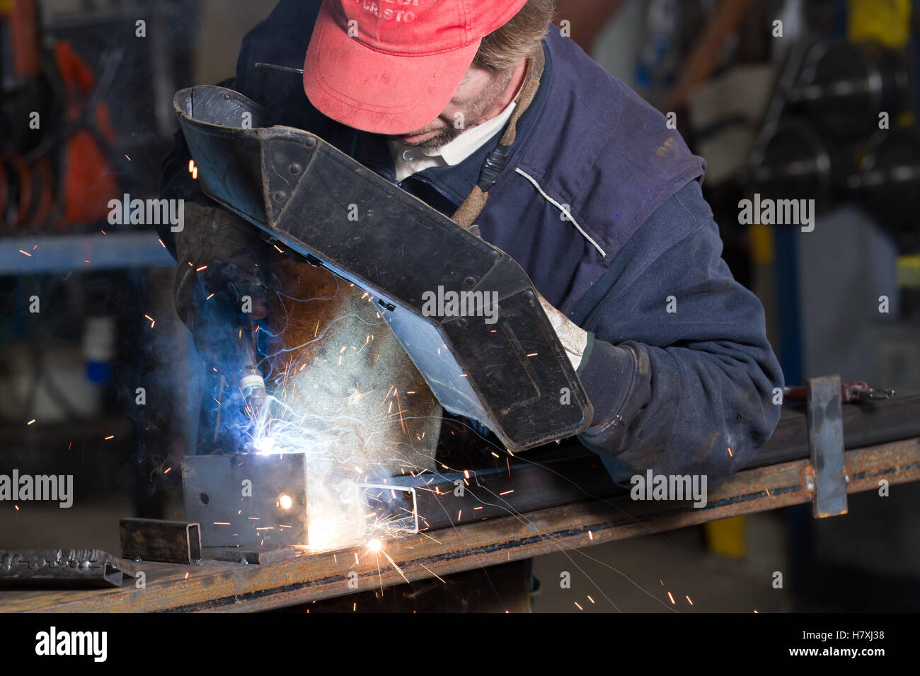 metalworker at work in his workshop Stock Photo - Alamy