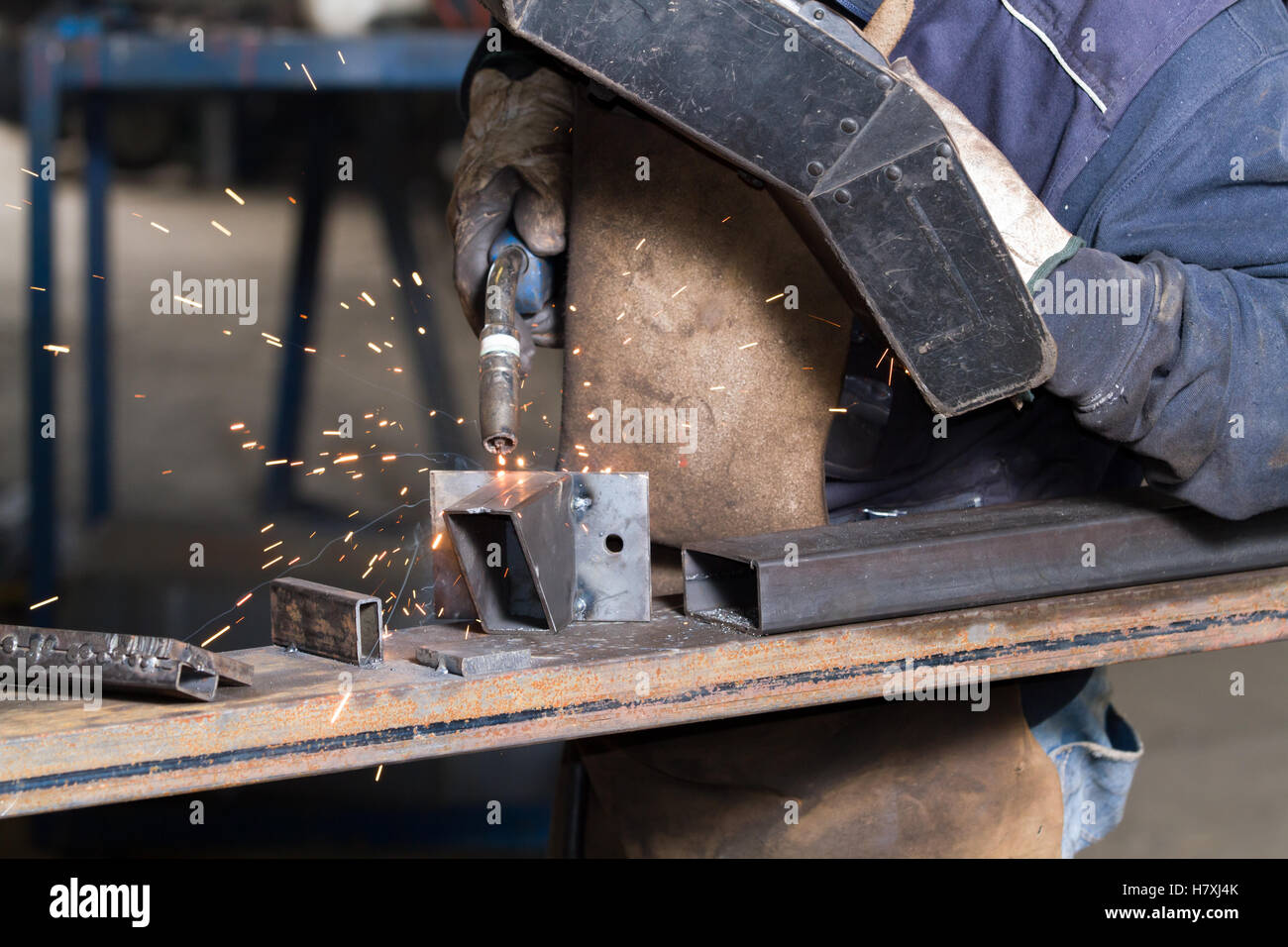 metalworker at work in his workshop Stock Photo - Alamy
