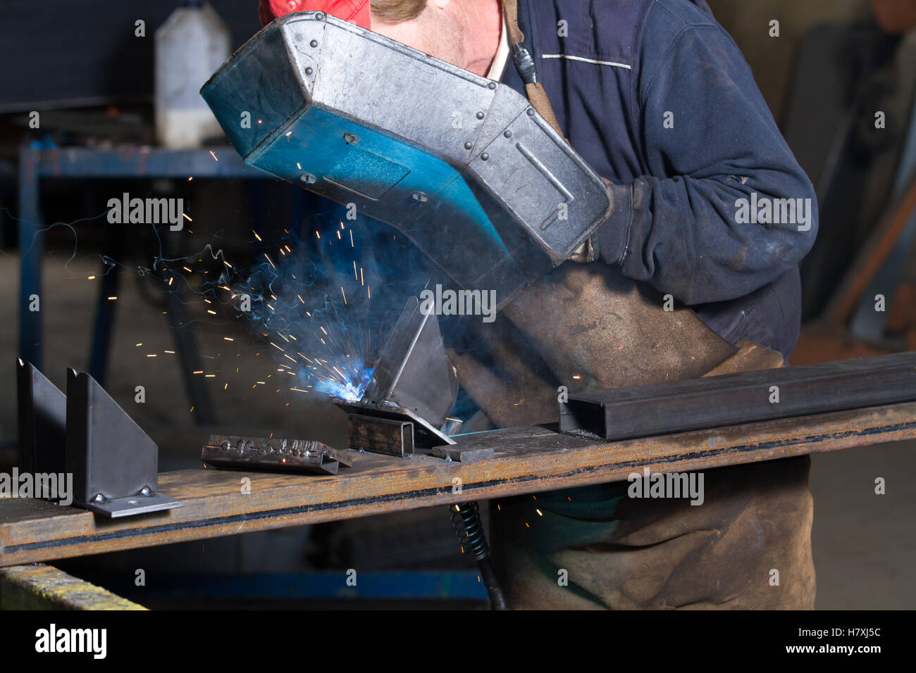 metalworker at work in his workshop Stock Photo - Alamy