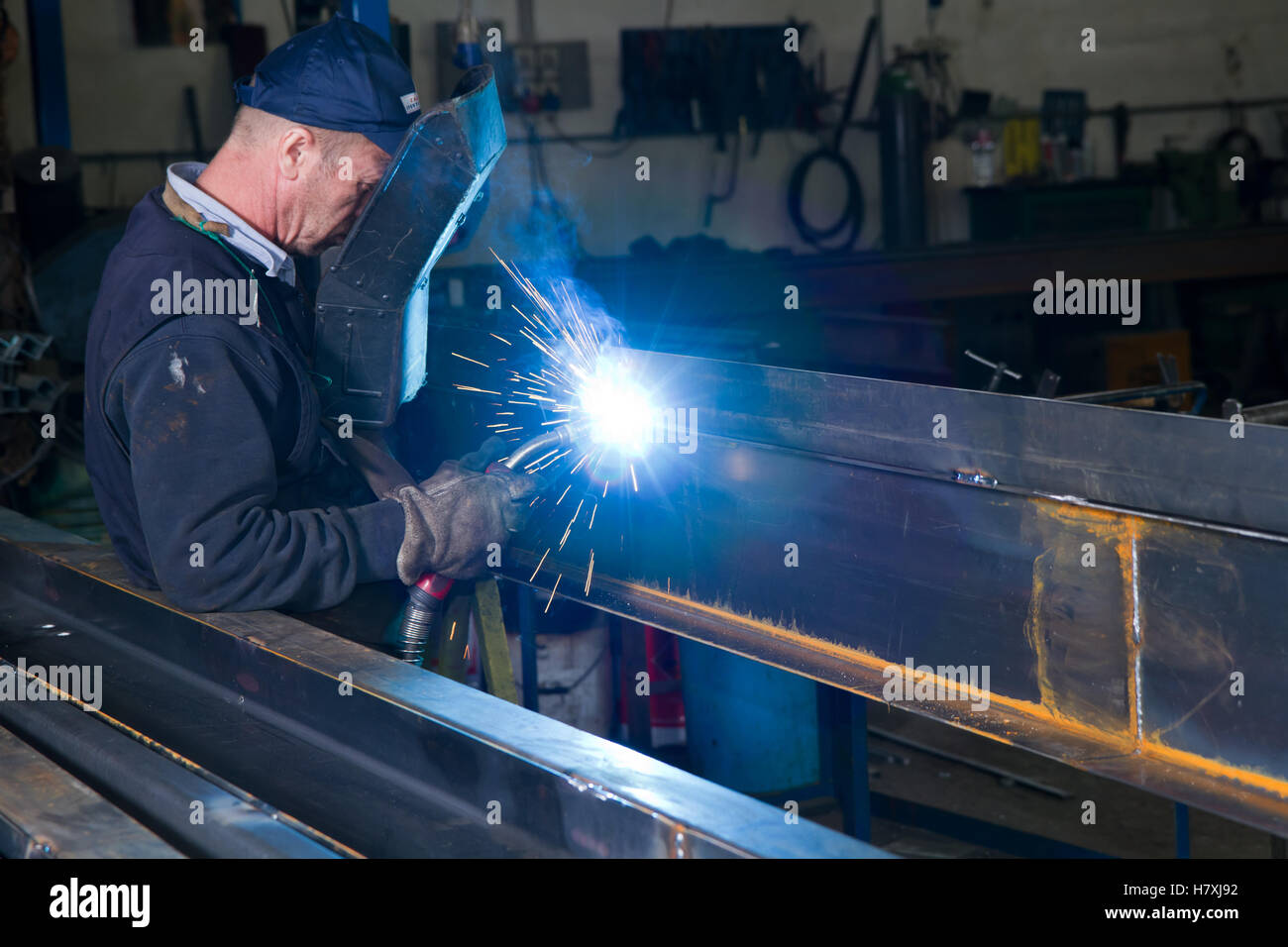 metalworker at work in his workshop Stock Photo - Alamy