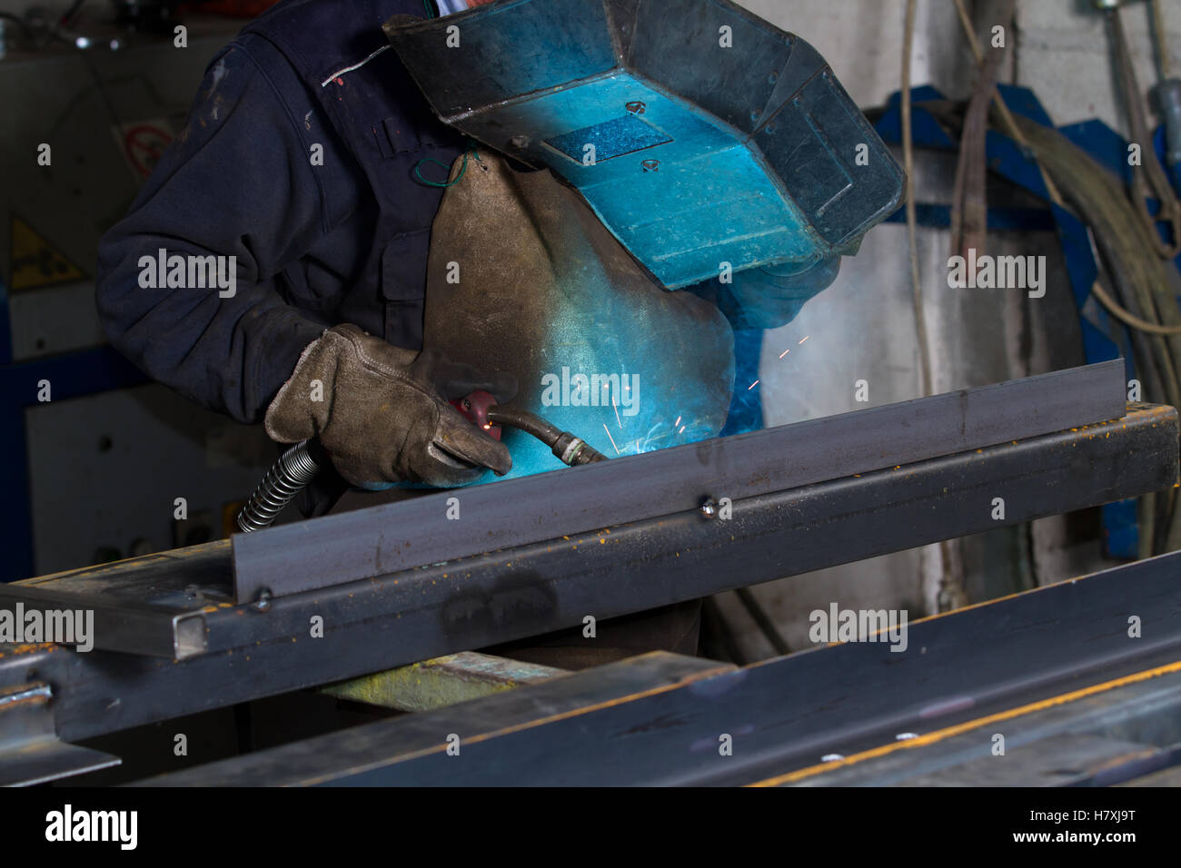 metalworker at work in his workshop Stock Photo - Alamy