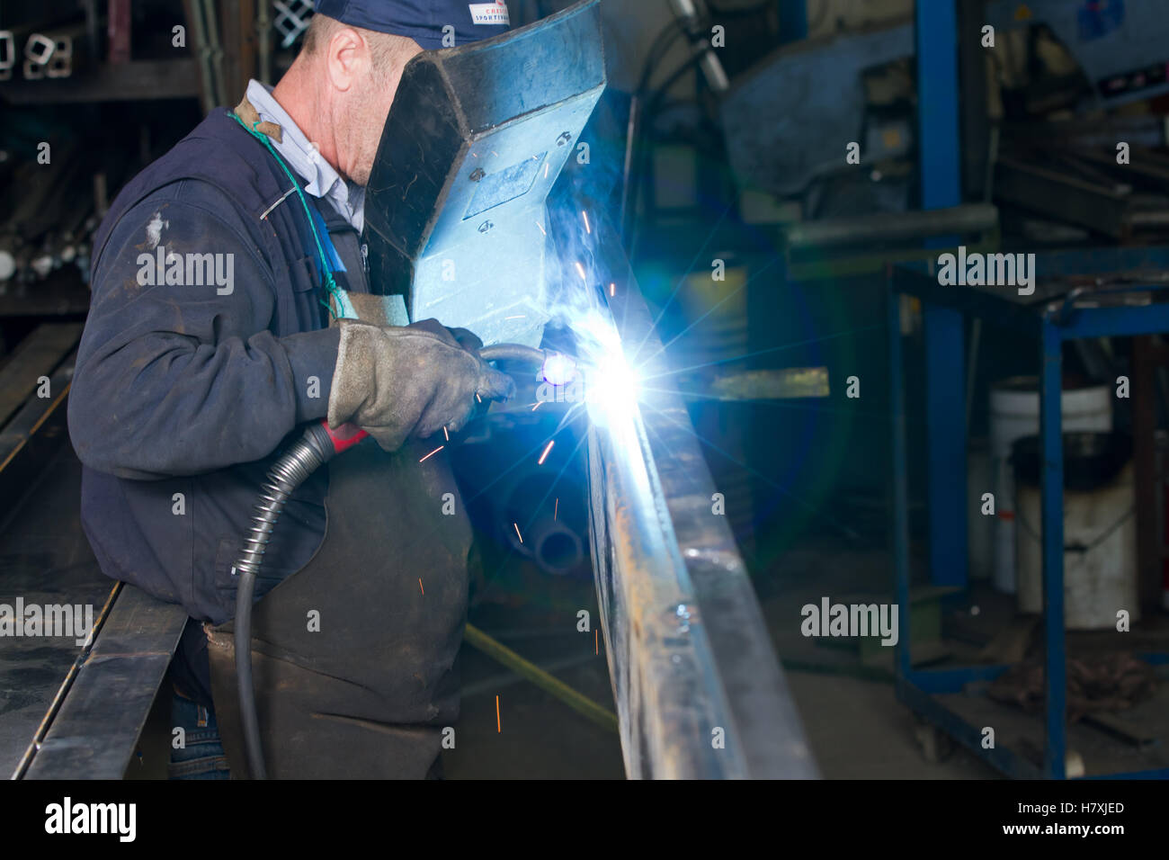 metalworker at work in his workshop Stock Photo - Alamy