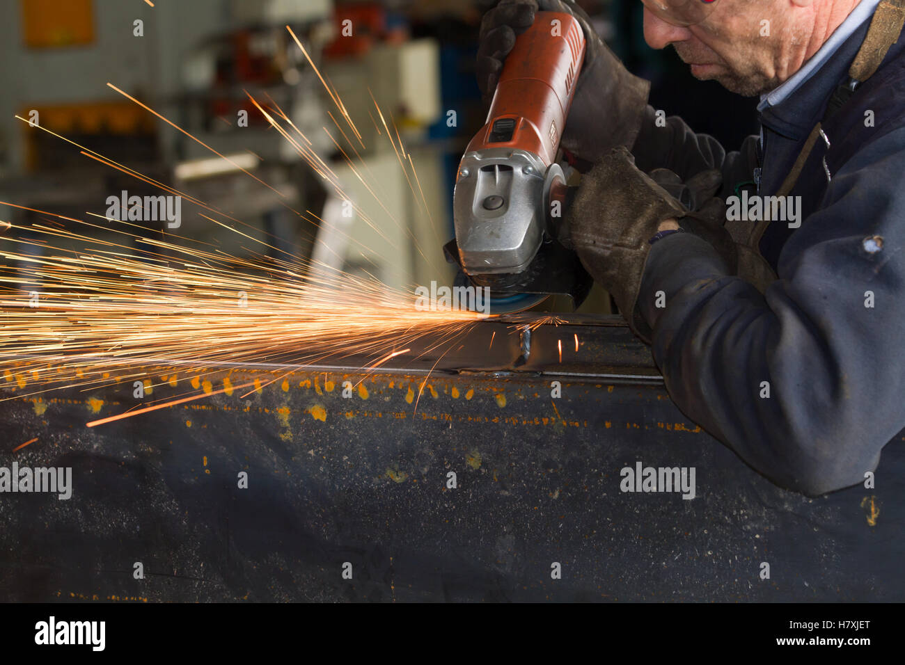 metalworker at work in his workshop Stock Photo - Alamy