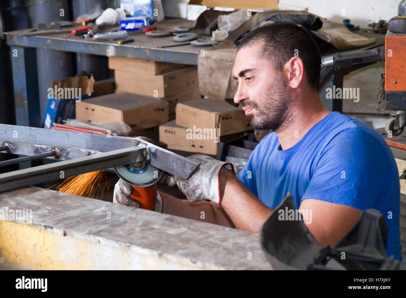 metalworker at work in his workshop Stock Photo - Alamy